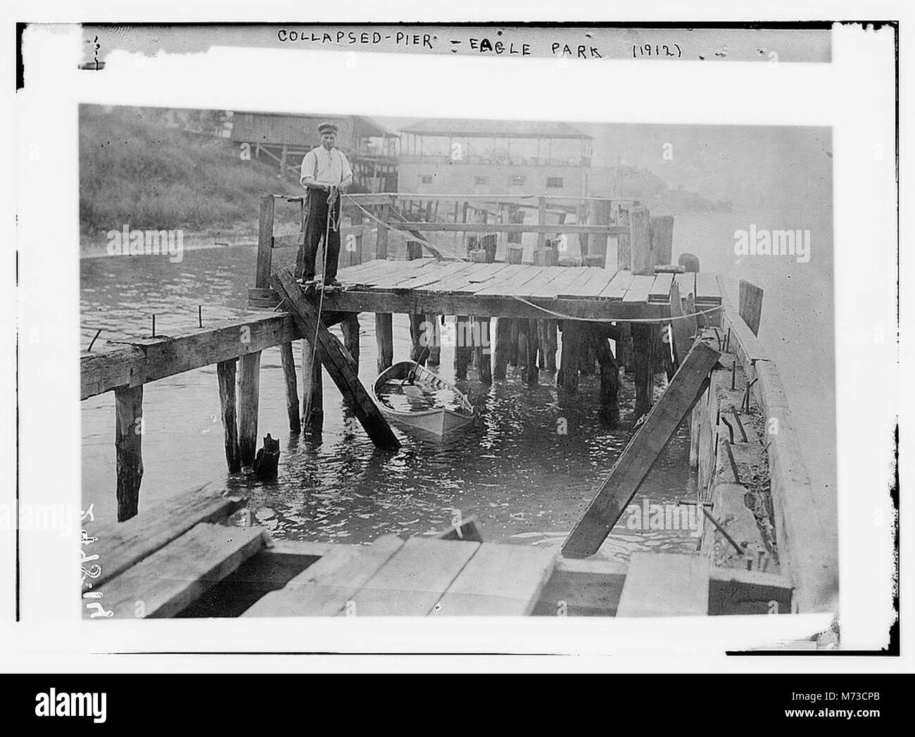 This photograph depicts the collapsed pier at Eagle Park in 1912 ...