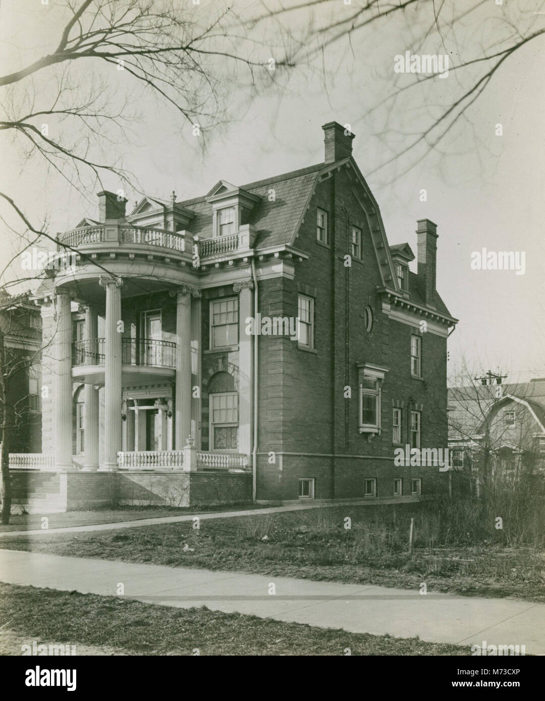 A photograph of a Colonial-style house in Chicago from the early 20th ...