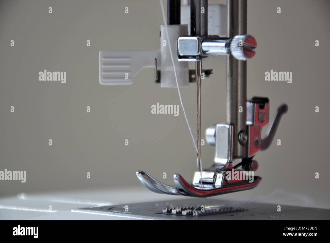 Foot and Needle of Sewing Machine Stock Photo - Alamy