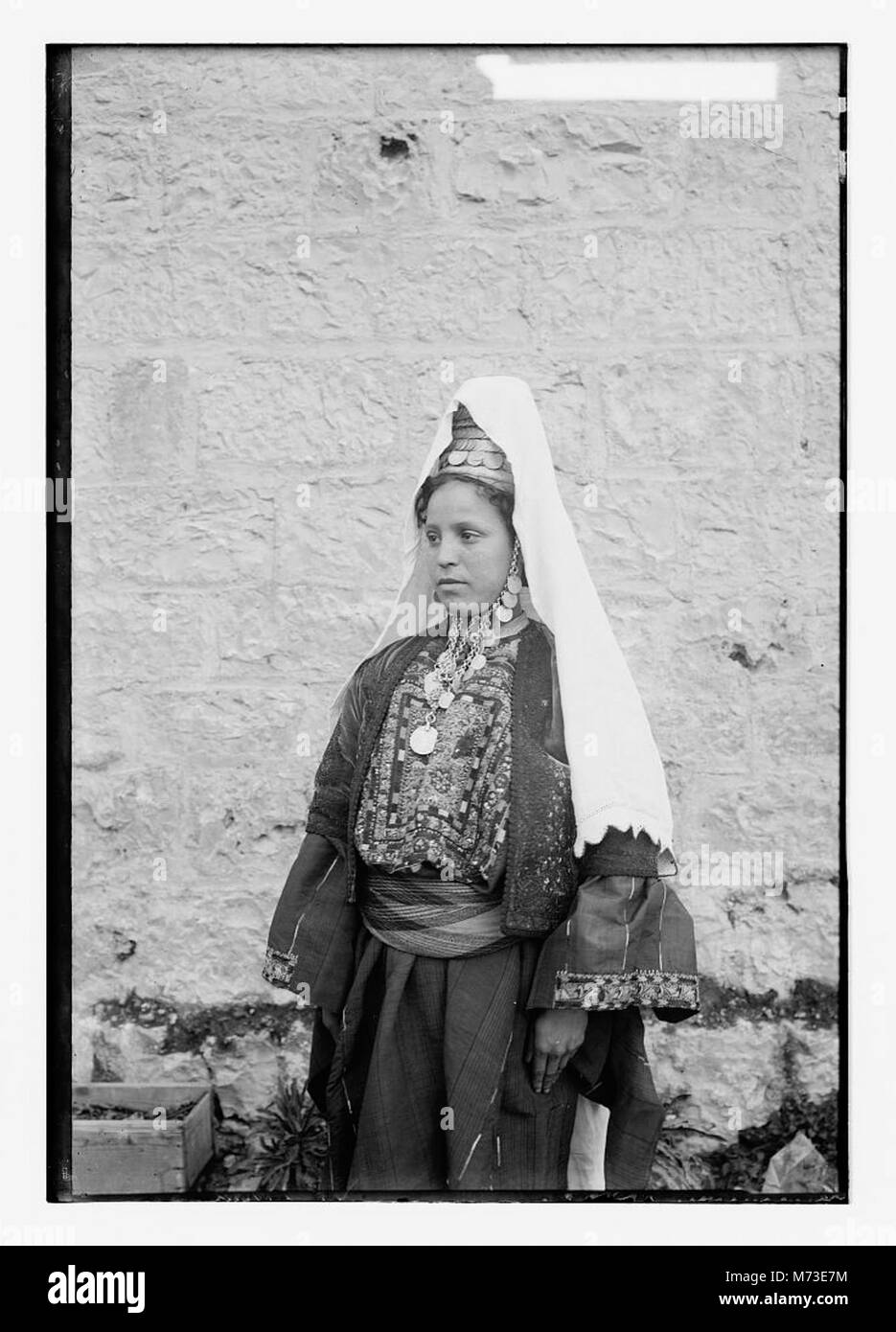 A photograph showcasing a Bethlehem woman dressed in traditional ...