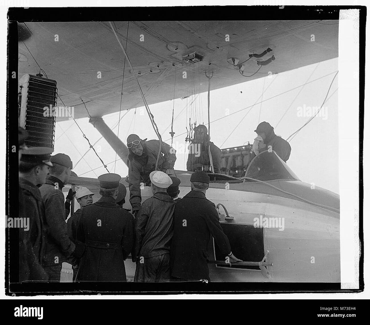 This photograph shows the crew of the C7, likely a vessel or aircraft ...
