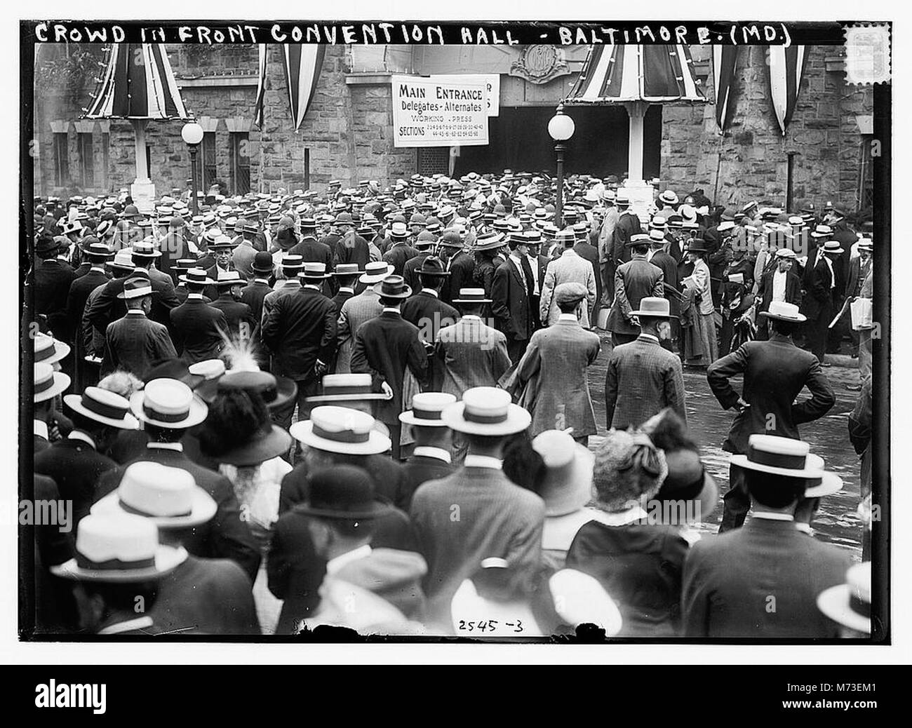 A photograph showing a crowd gathered outside Convention Hall in ...
