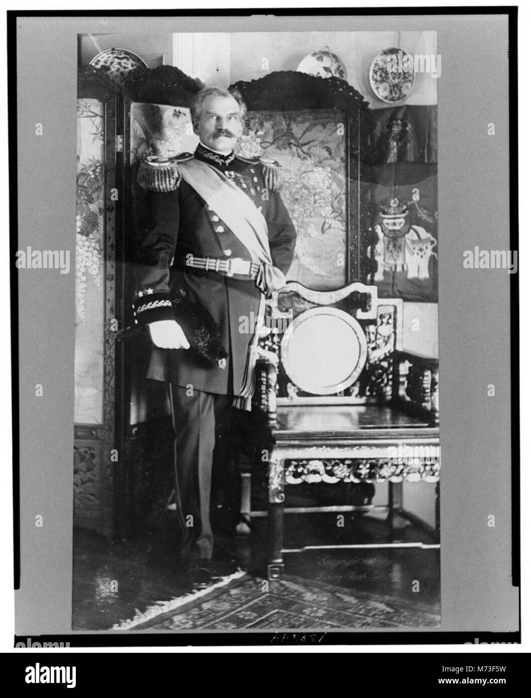 Adna R. Chaffee, a prominent military figure, is seen in a full-length ...