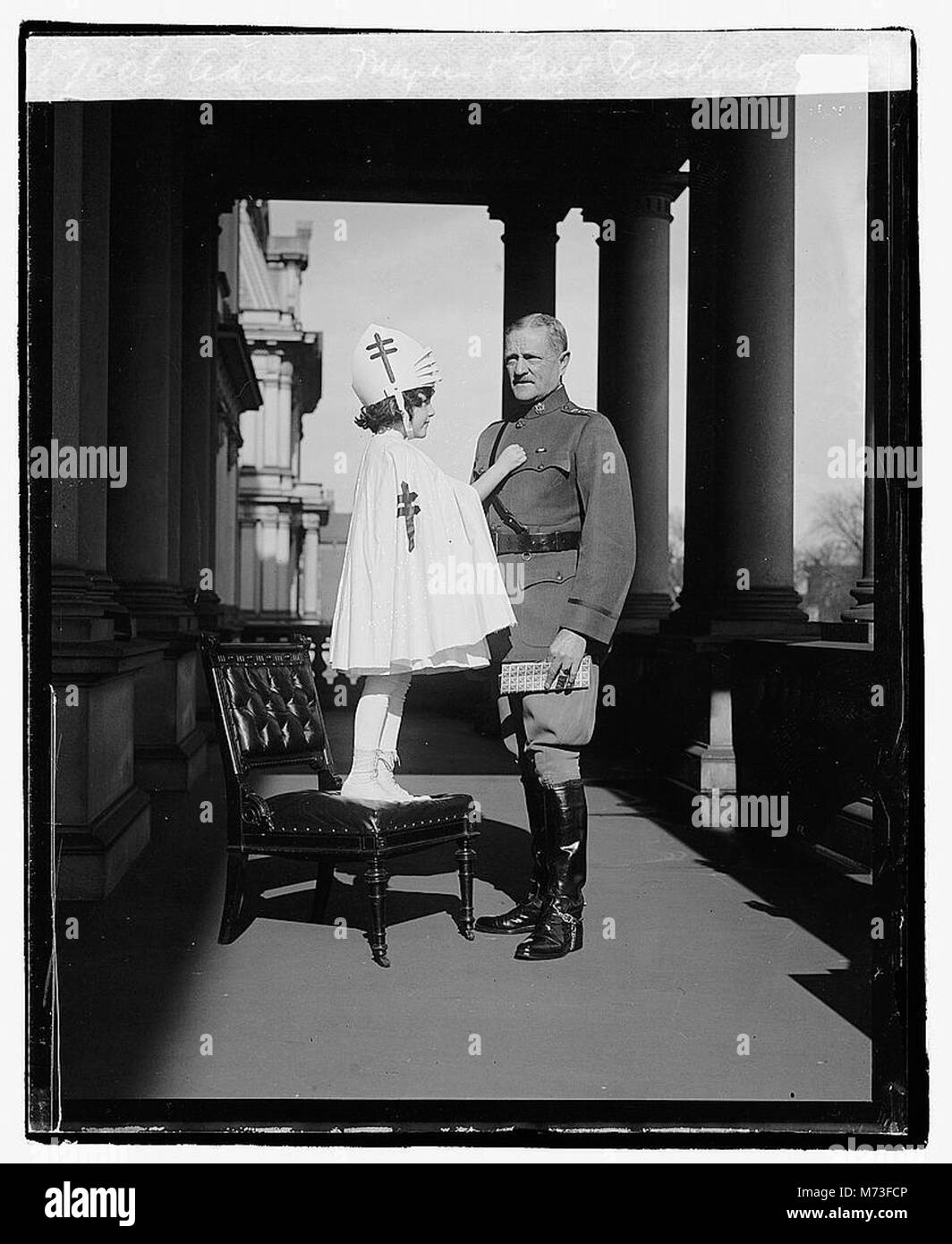 A photograph of Adrienne Meyers with General Pershing, cataloged under ...