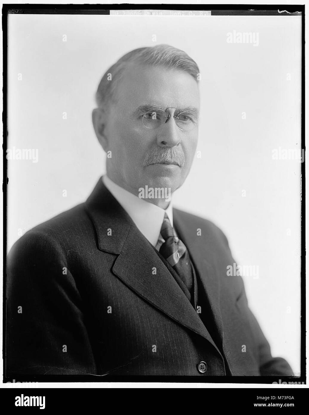 A formal portrait of C.R. Davis, an honorable figure from American ...
