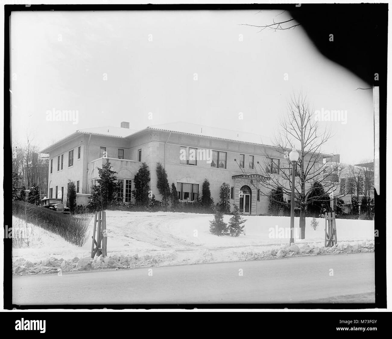 A photograph of the exterior of James J. Davis's home, highlighting the ...