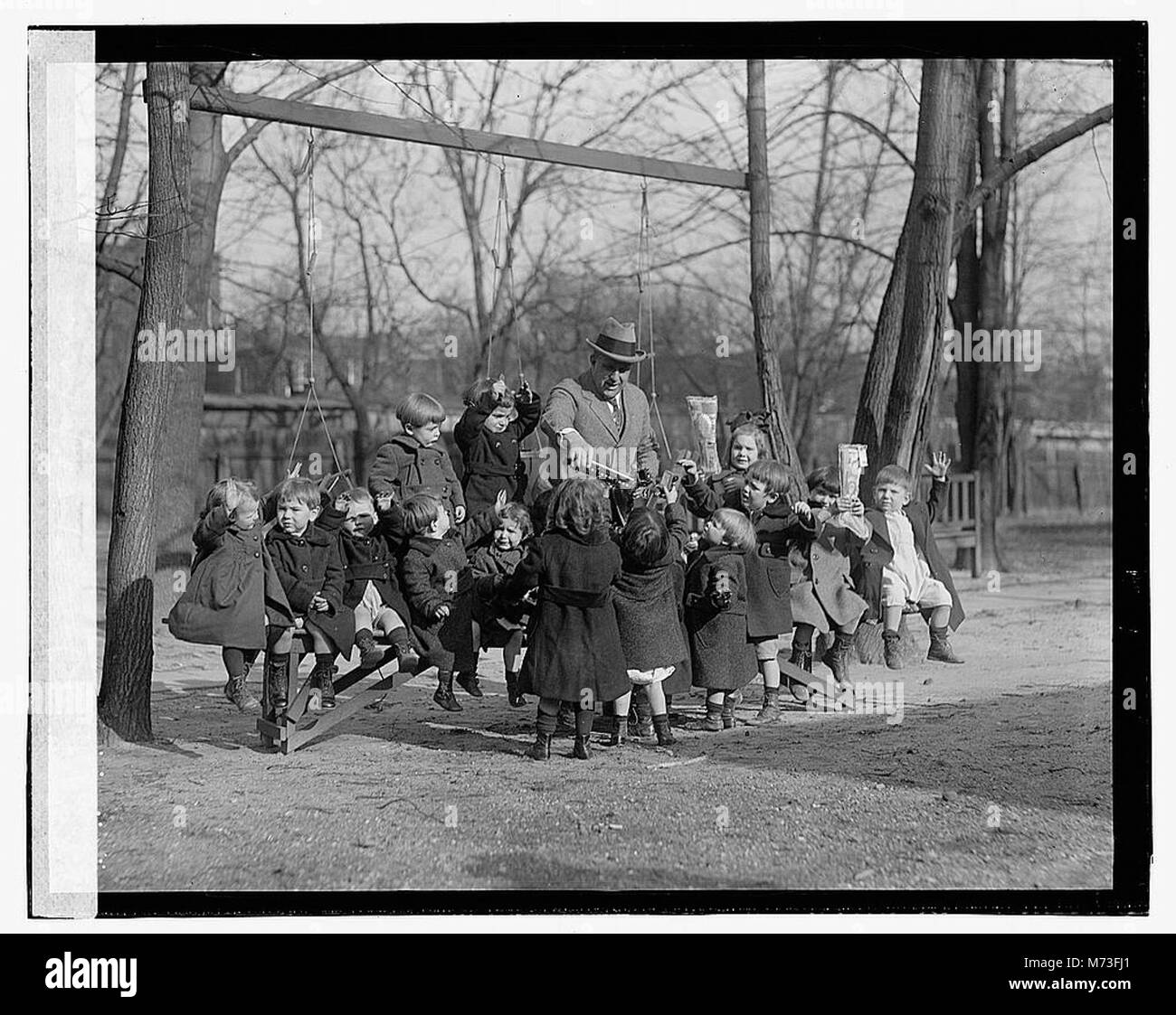 A photograph from 1922 showing Davis with a group of orphans, capturing ...