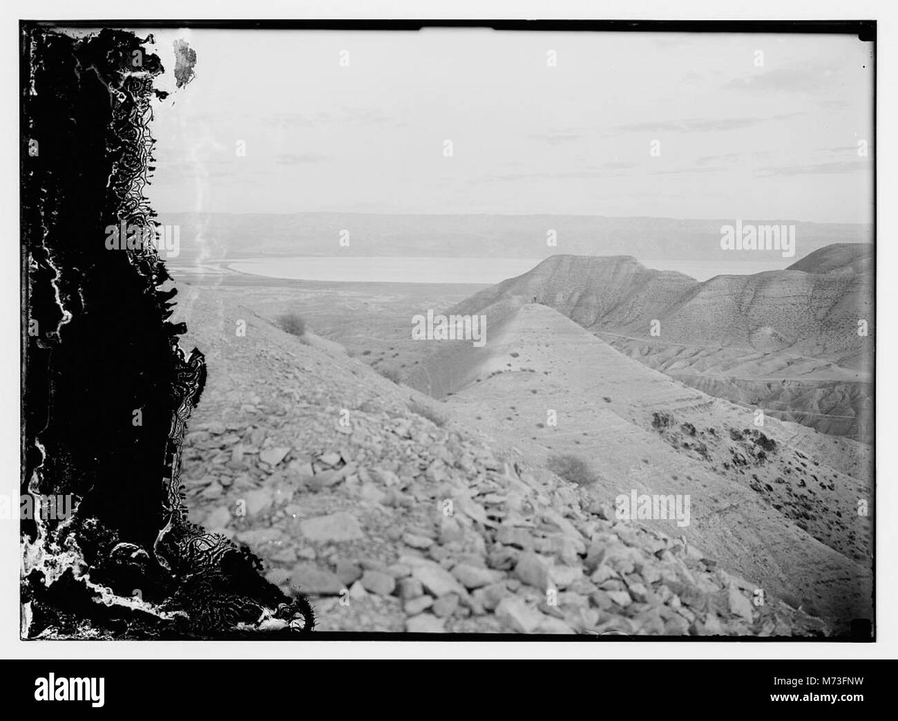 A photograph of the Dead Sea, a saltwater lake bordered by Jordan ...