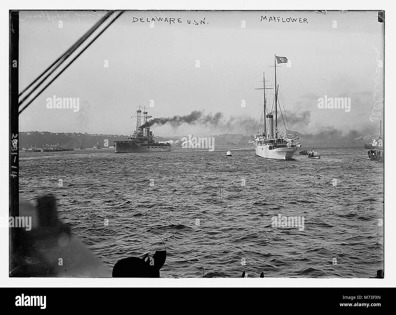 This photograph captures the Delaware U.S.N. ship and the Mayflower ...