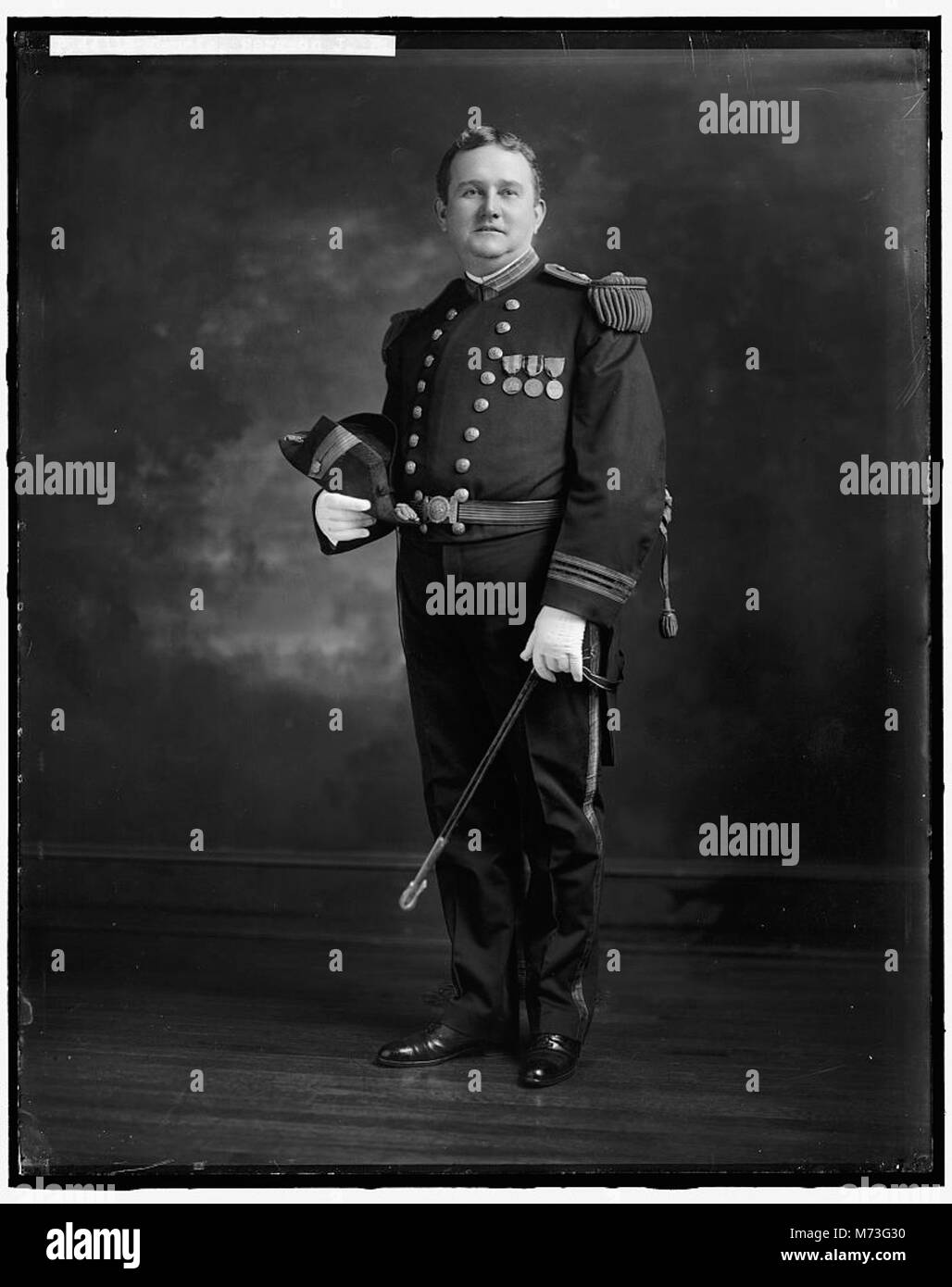 A portrait of Sergeant J.B. Dennis, an enlisted military figure ...
