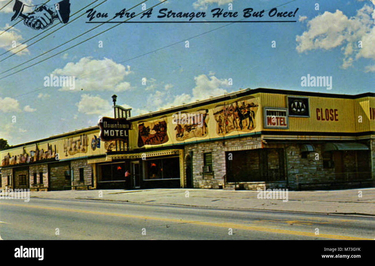 A photograph of the Downtown Motel, showcasing the building’s exterior ...
