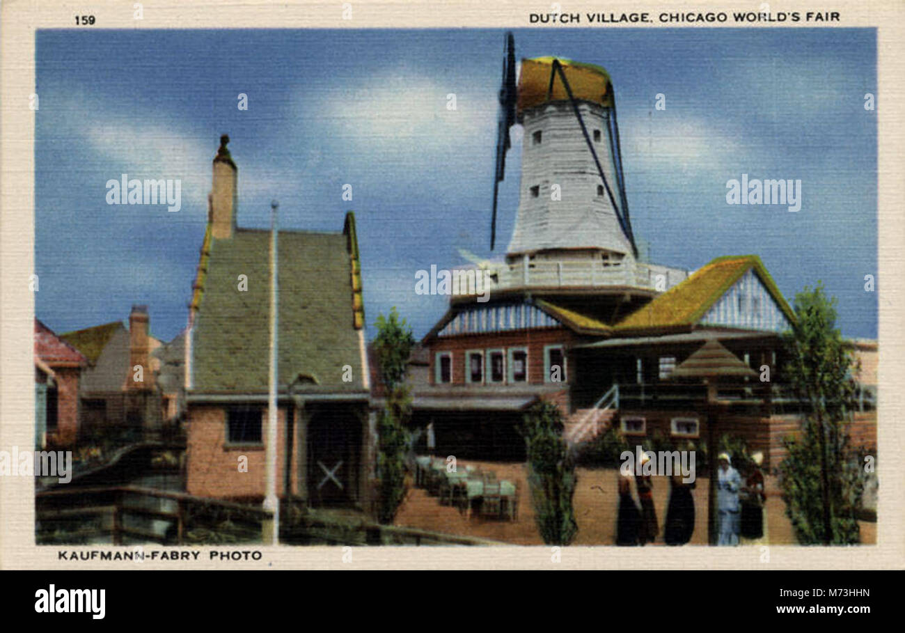 A photograph of a Dutch village, showing traditional architecture and ...