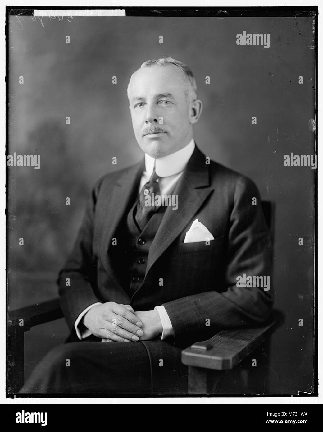 A portrait of H.C. Earle, capturing him in a formal setting. This image ...