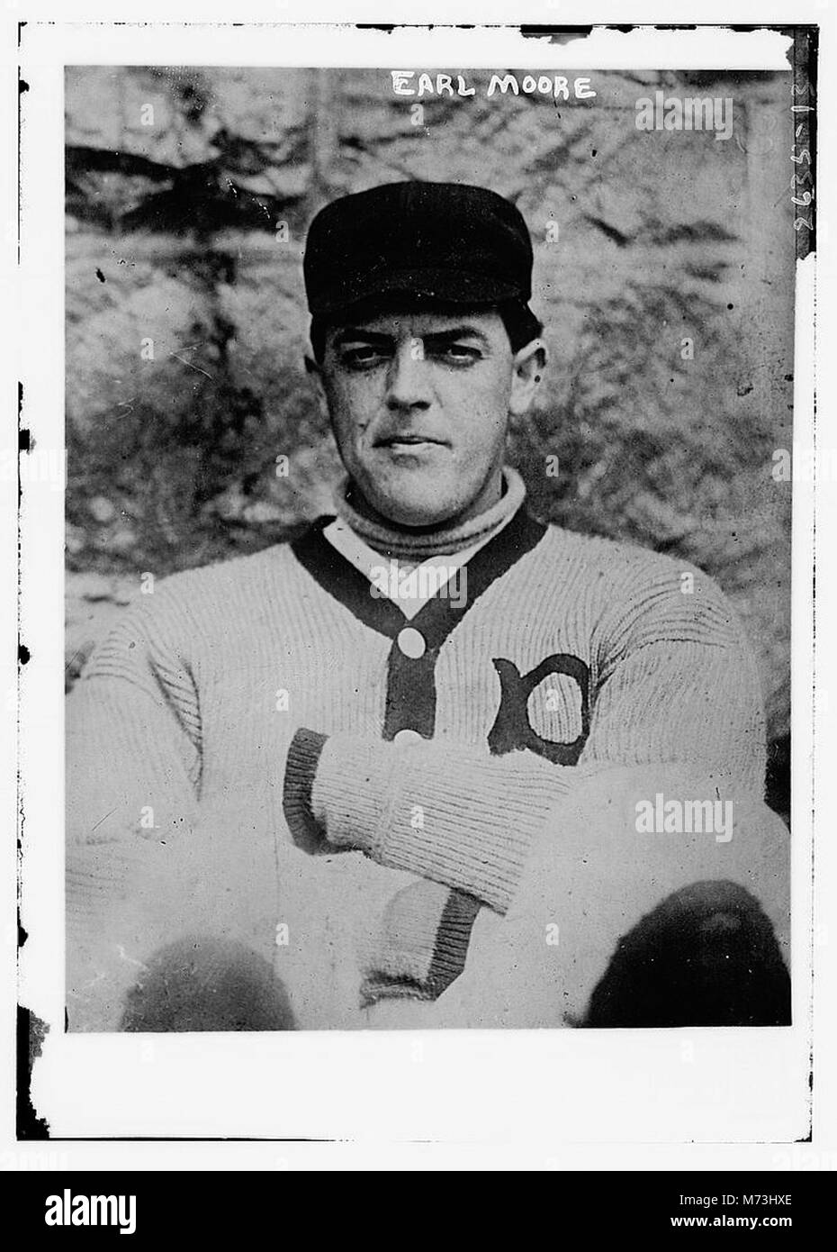 This photograph features Earl Moore, a Major League Baseball pitcher ...