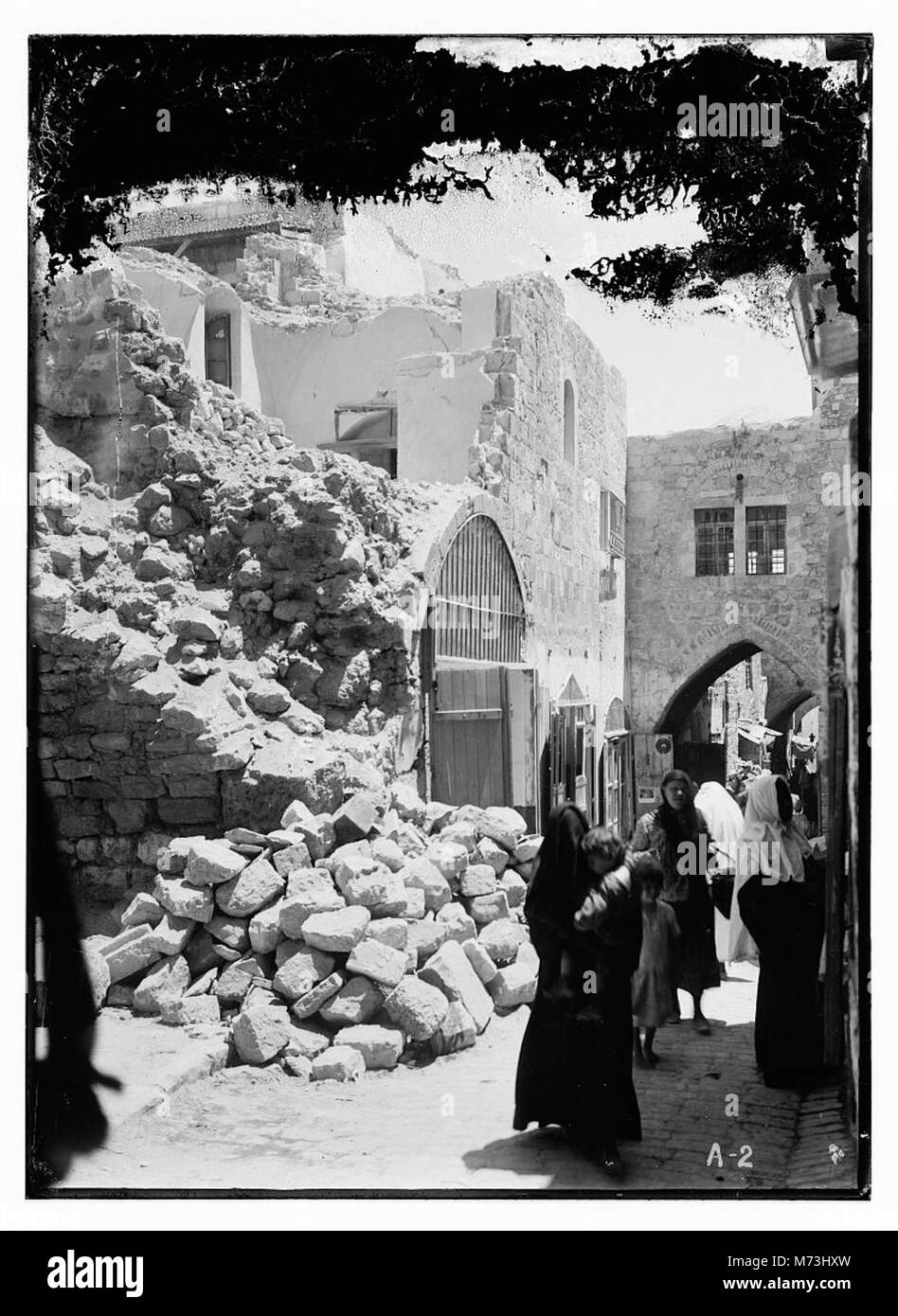Photograph showing the damage caused by an earthquake, capturing the ...