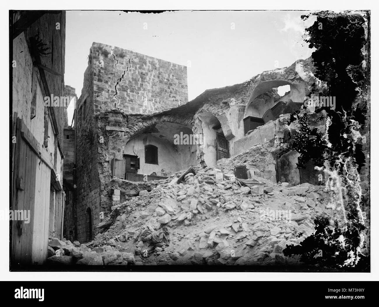 A photograph showing the damage caused by an earthquake, documenting ...