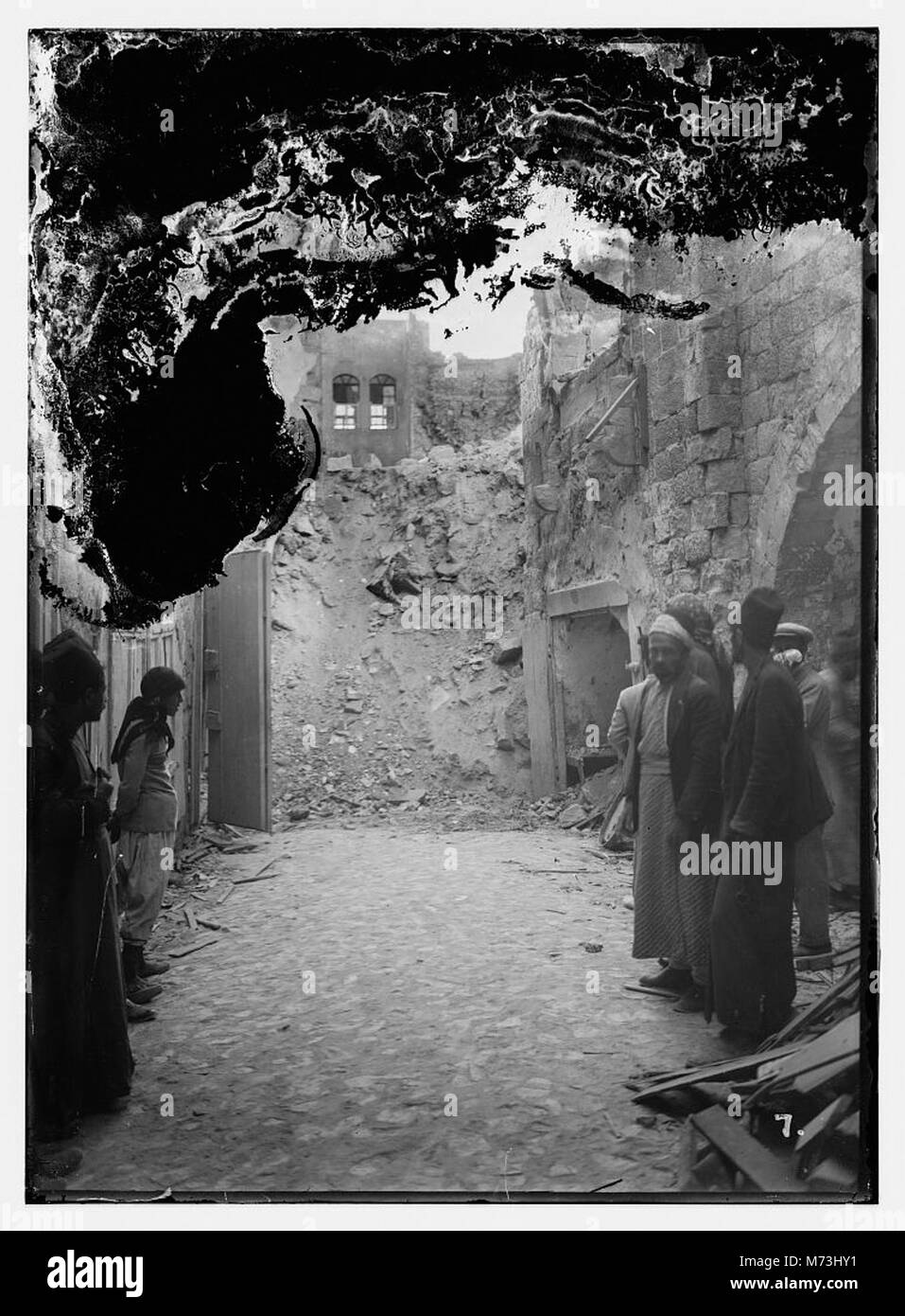 A photograph documenting the damage caused by an earthquake, capturing ...