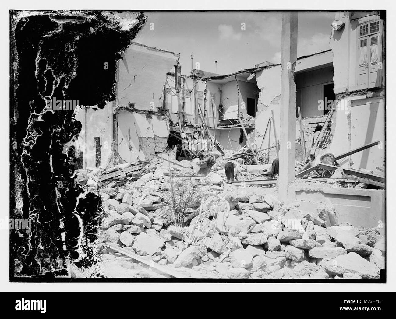A dramatic photo showing the aftermath of an earthquake, highlighting ...
