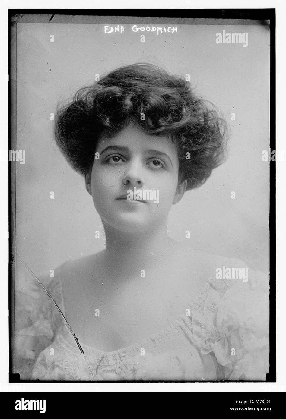 This image is a portrait of Edna Goodrich, captured in an archival ...