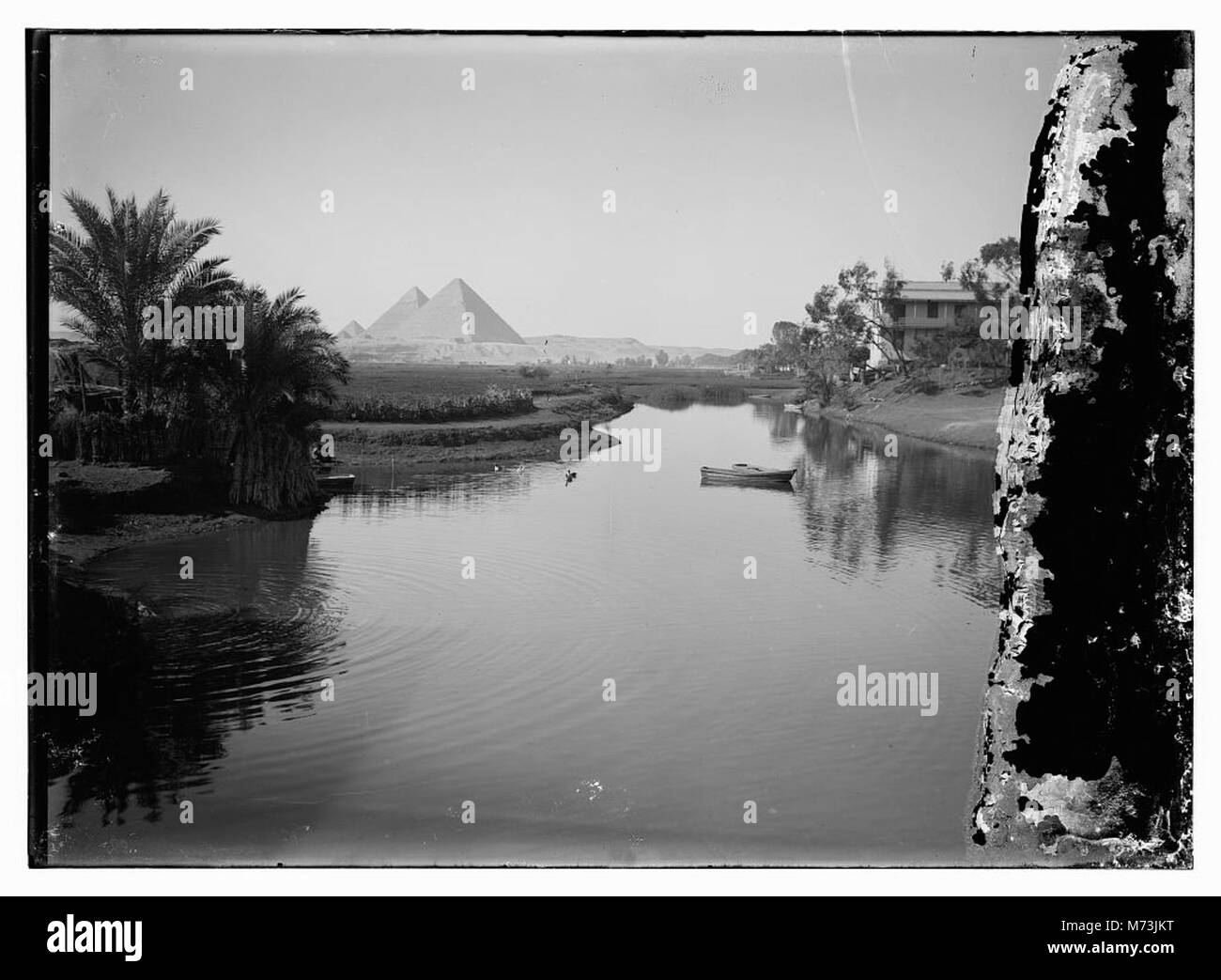 This image showcases the iconic Nile River and the famous pyramids of ...