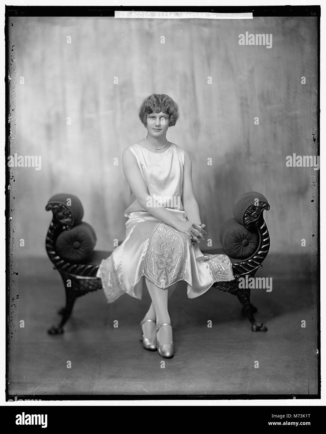 A portrait of Martha L. Ellis, capturing her likeness in a historical ...