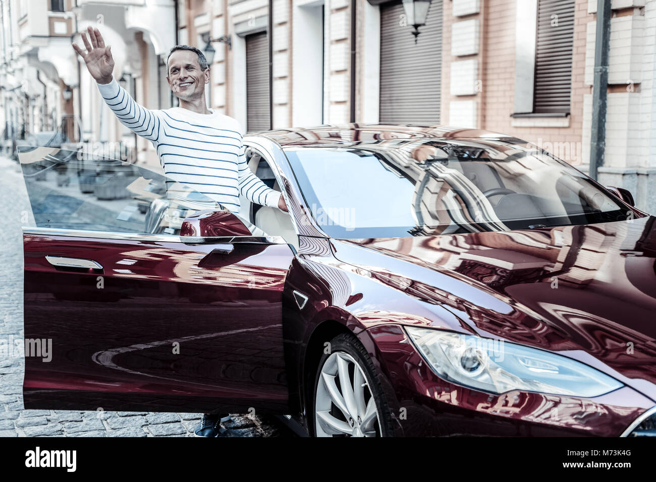 Person getting in automobile hi-res stock photography and images - Alamy