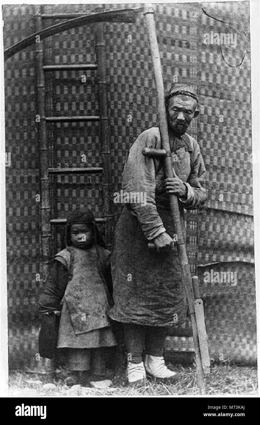 A historical image of an agricultural laborer at work, showcasing the ...