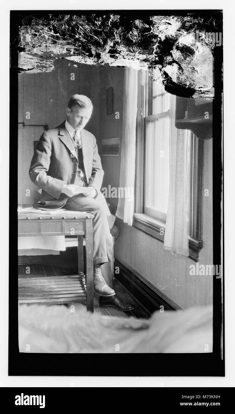 Eric Matson, an individual captured in a photograph sitting on the edge ...