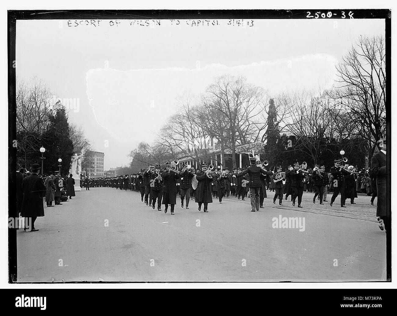 A historical photograph showing an escort for President Woodrow Wilson ...