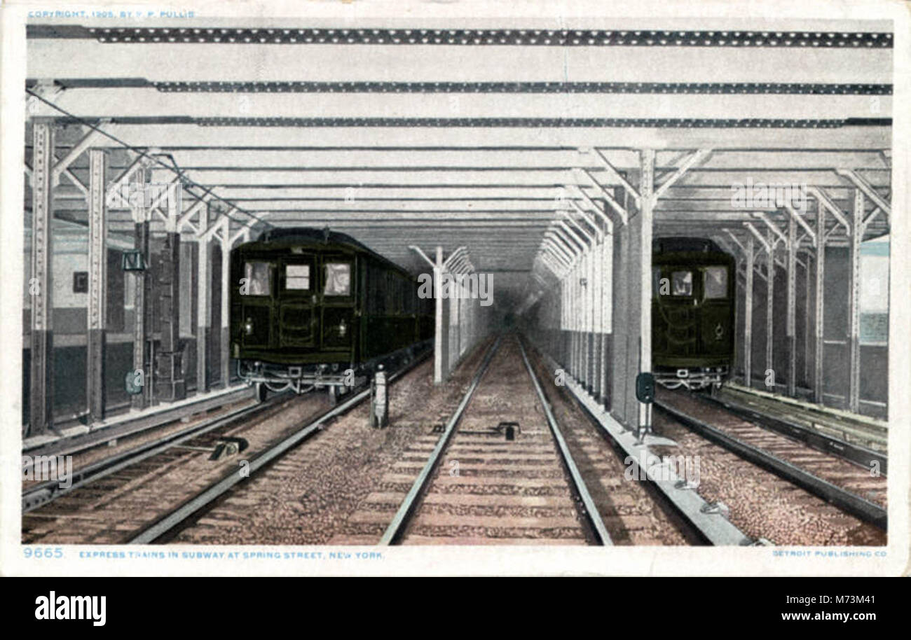 Photograph of express trains running in the subway at Spring Street ...