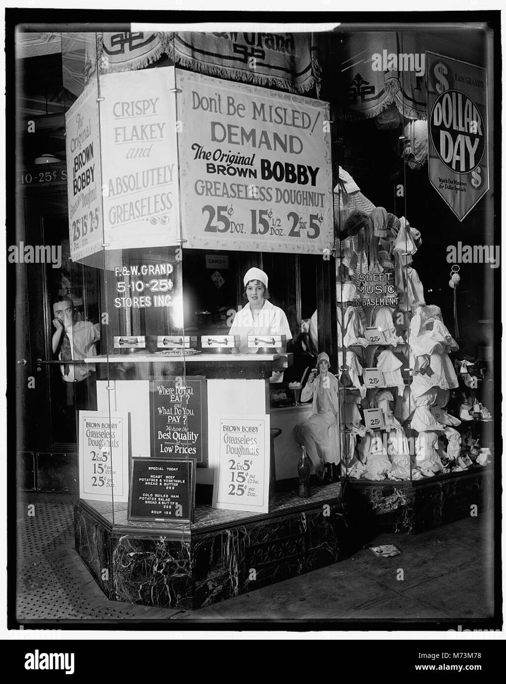 This image depicts the F.W. Grand Store, showcasing its exterior and ...