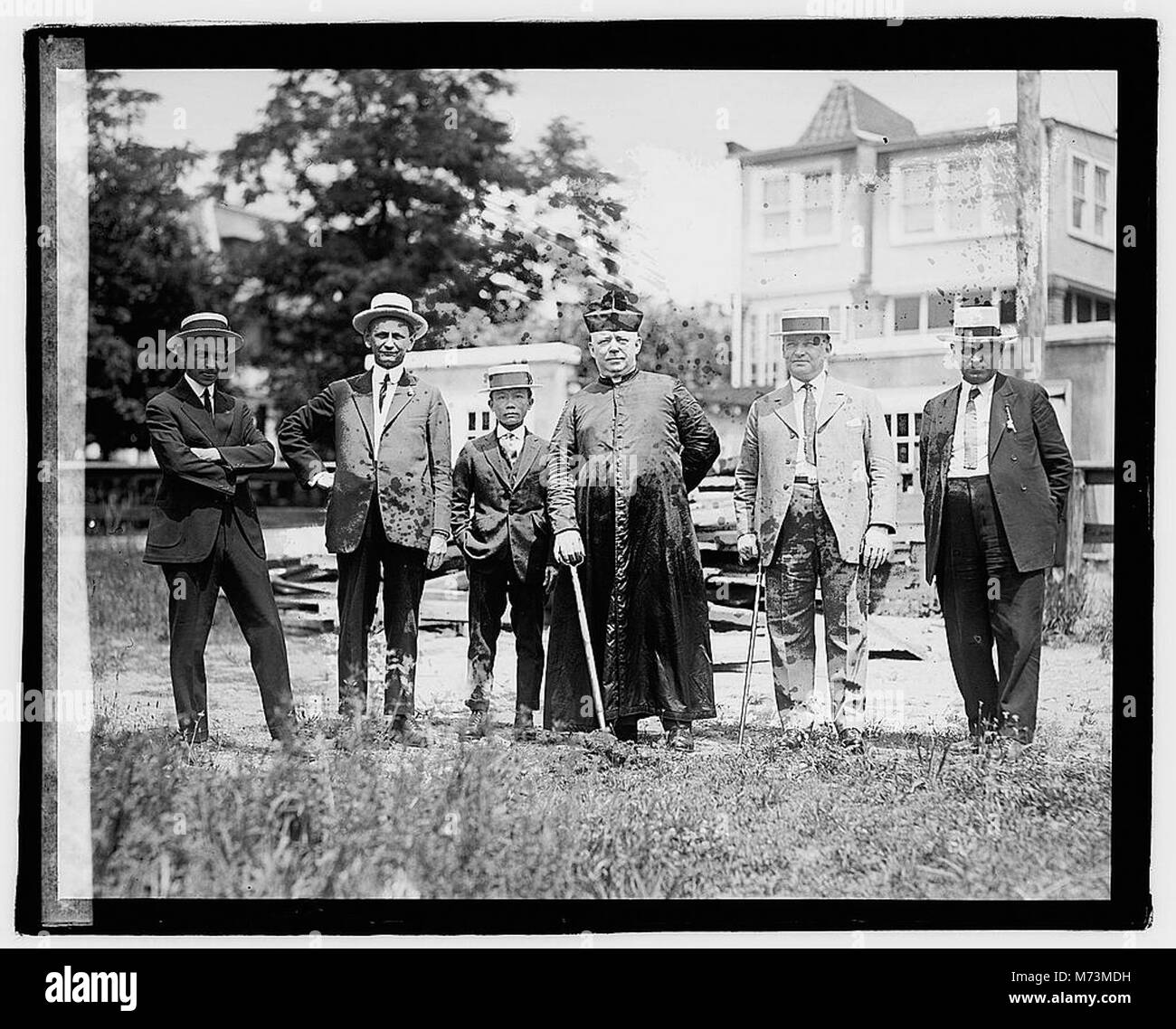 A photograph of Father Walsh, dated June 12, 1922. The image captures a ...