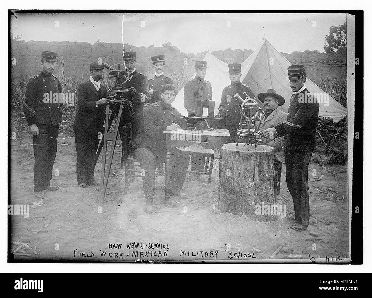 A group of students at a Mexican military school is depicted engaged in ...