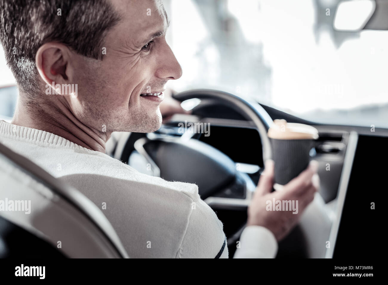 Happy joyful man driving a car Stock Photo - Alamy