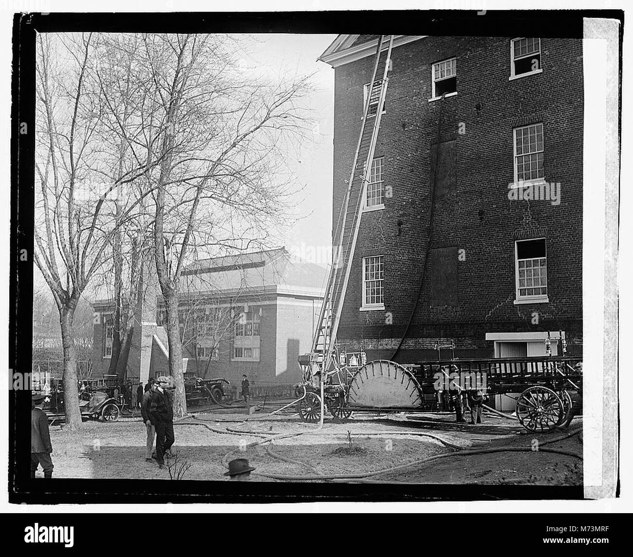 A historic photograph of a fire at Georgetown College, capturing the ...