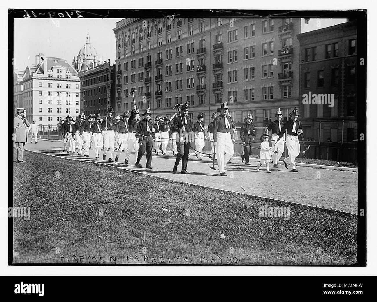 Firemen parading on May 30, capturing a ceremonial procession of ...