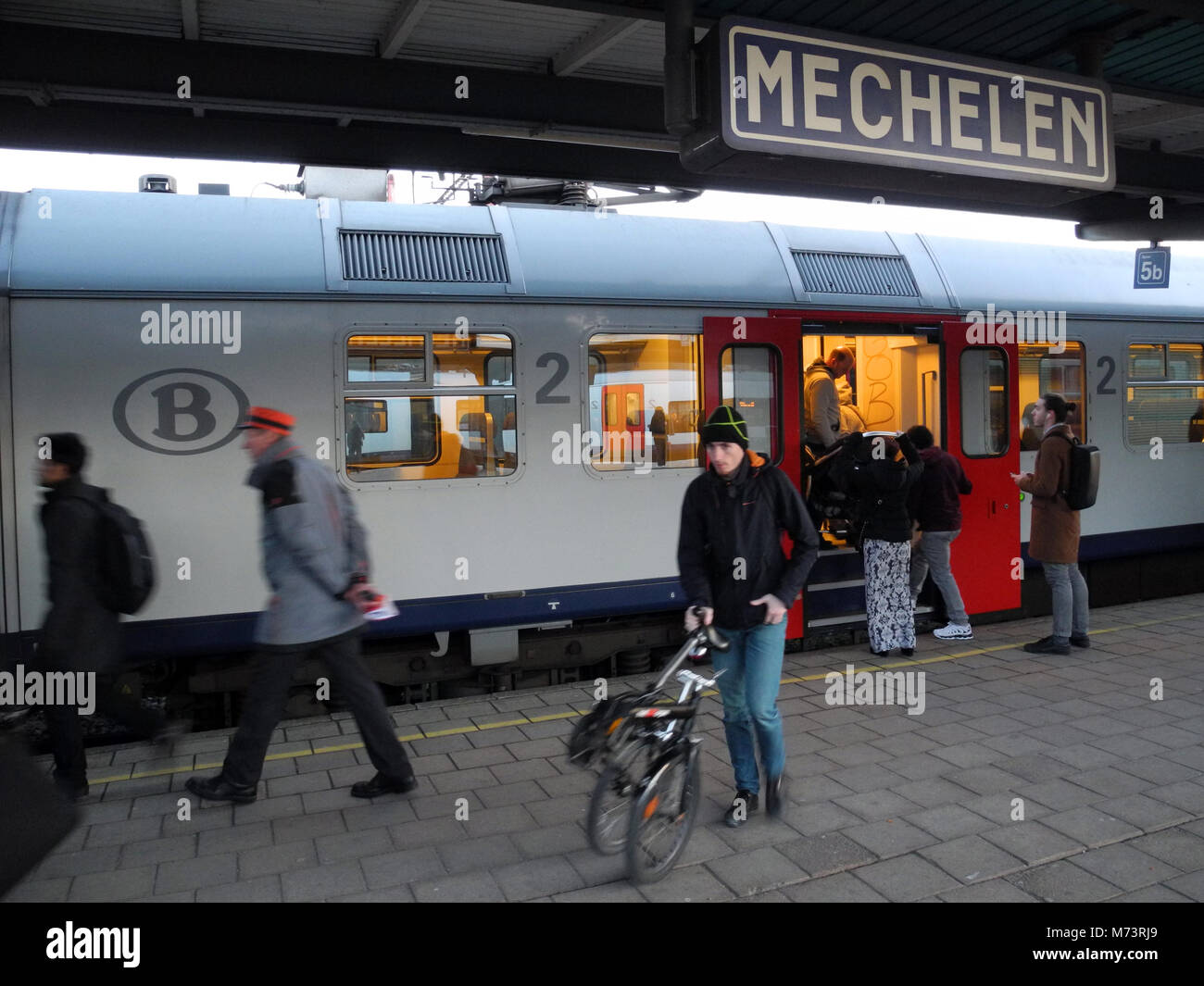 Getting off a train hi-res stock photography and images - Alamy