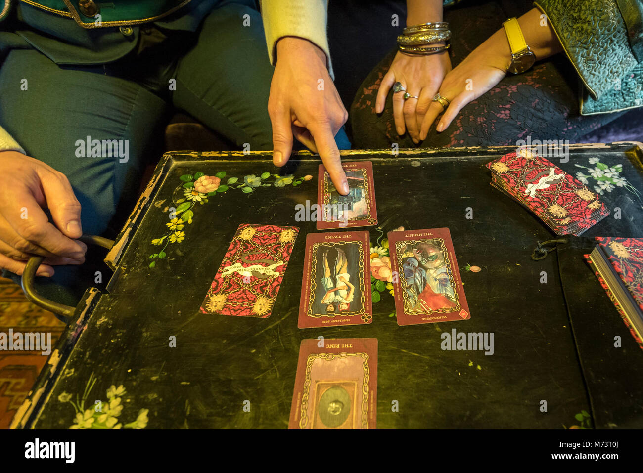 London, UK. 8 March 2018. British artist Alice Instone (R) gives a ...