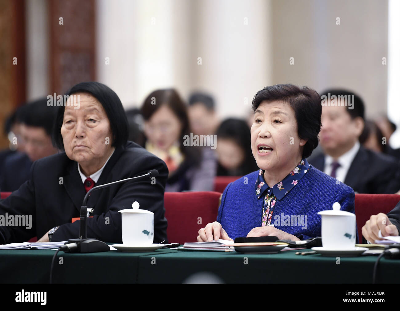 Beijing, China. 8th Mar, 2018. Shen Jilan (L) and Guo Fenglian ...