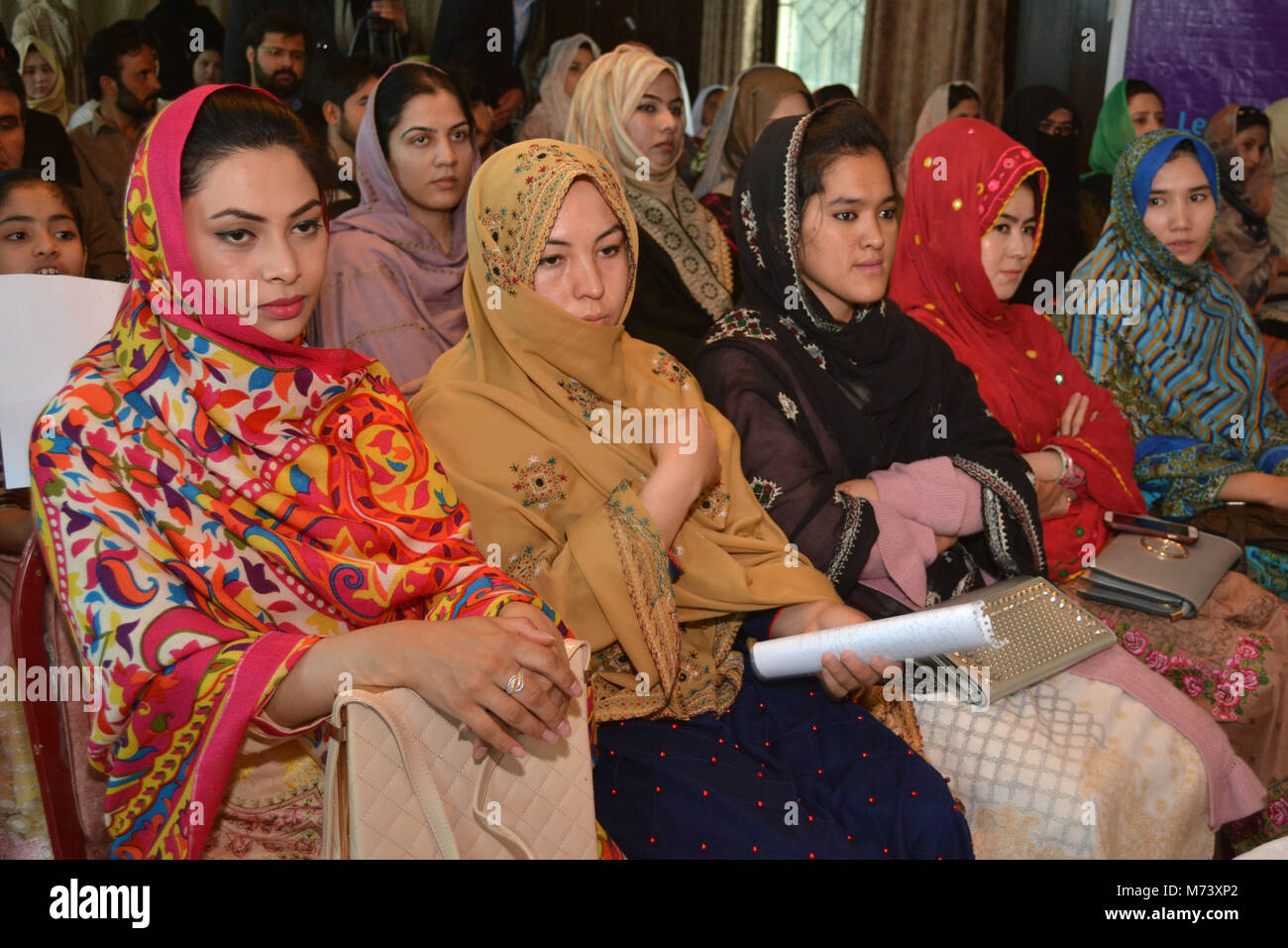 Quetta, Pakistan. 8th Mar, 2018. Girls listing guest peach during ...