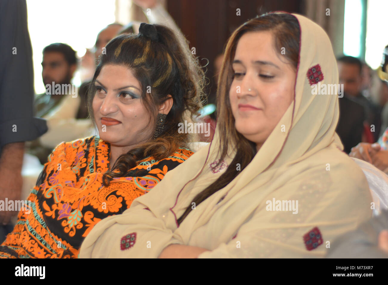 Quetta, Pakistan. 8th Mar, 2018. Girls listing guest peach during ...