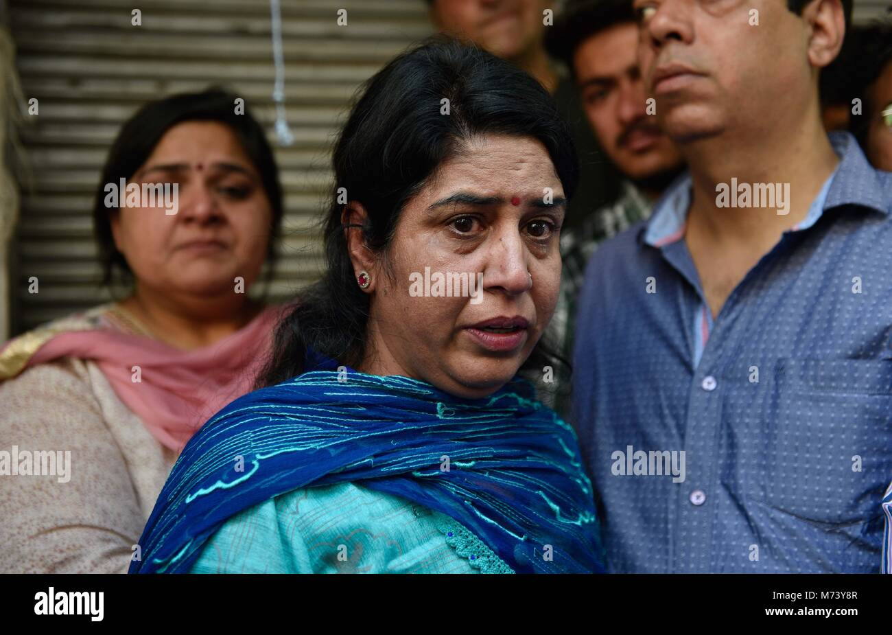 NEW DELHI, INDIA - MARCH 8: Shopowners crying after their shops got ...