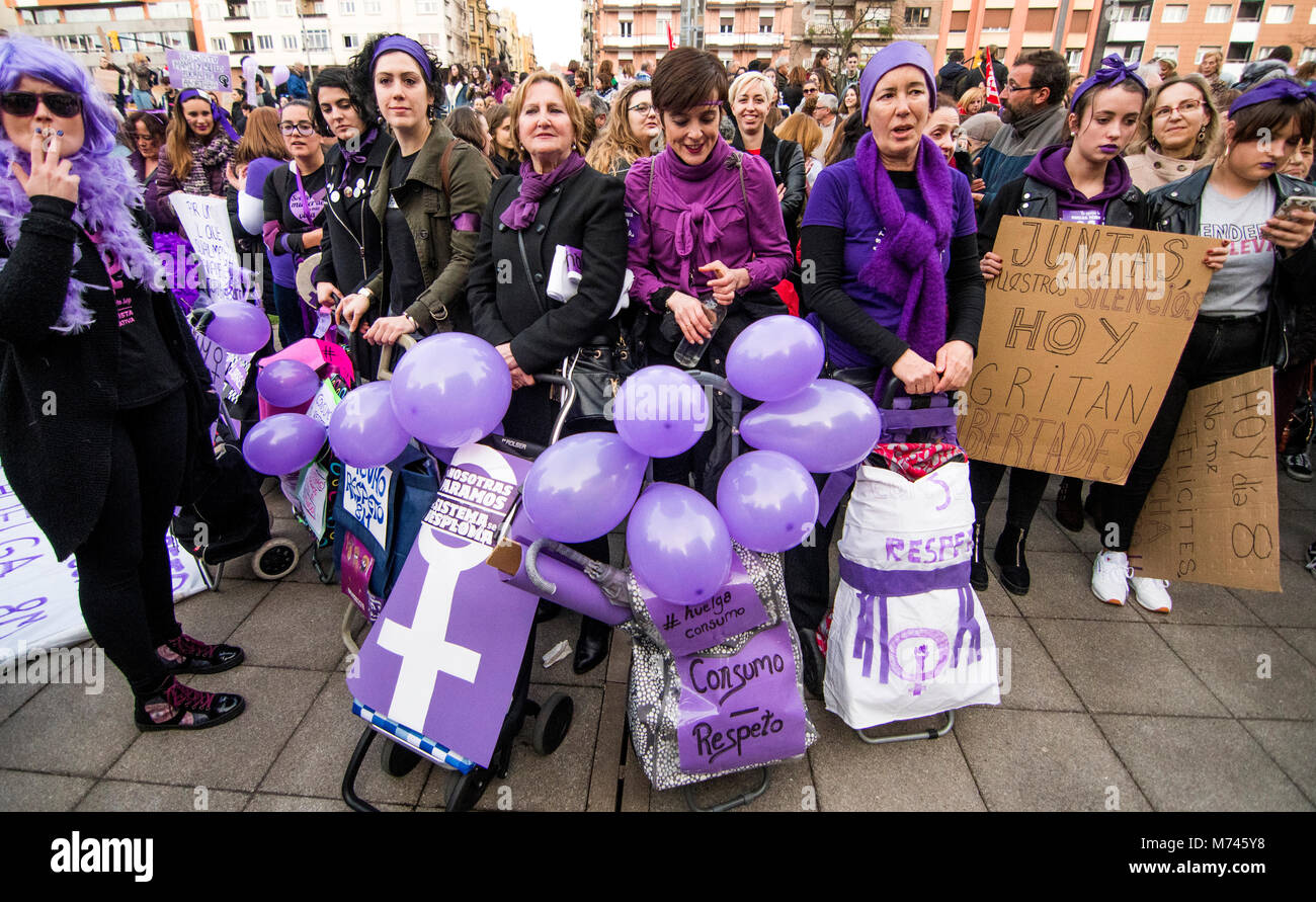 Gijon, Spain. 8th March, 2018. Woman protester seen with purple clothes ...