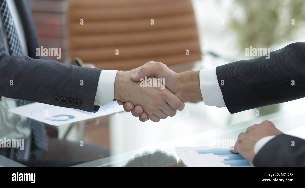 handshake of business partners on business negotiations Stock Photo - Alamy