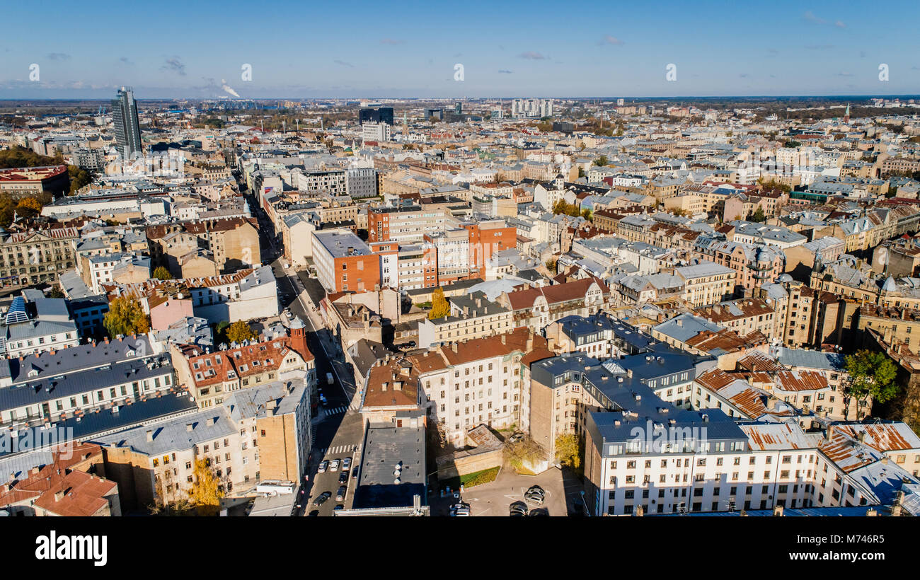 Riga city Autumn sunrise buildings living houses Drone old town roof ...