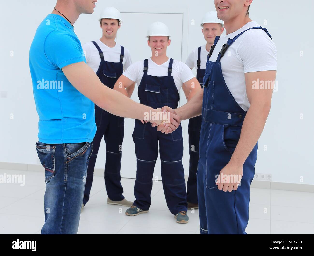 handshake of the architect and engineer Stock Photo - Alamy