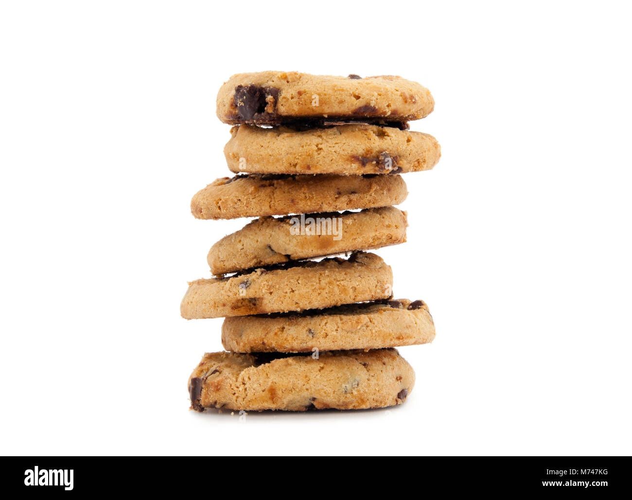 A pile of chocolate chip biscuits stack cut out and isolated on a white ...