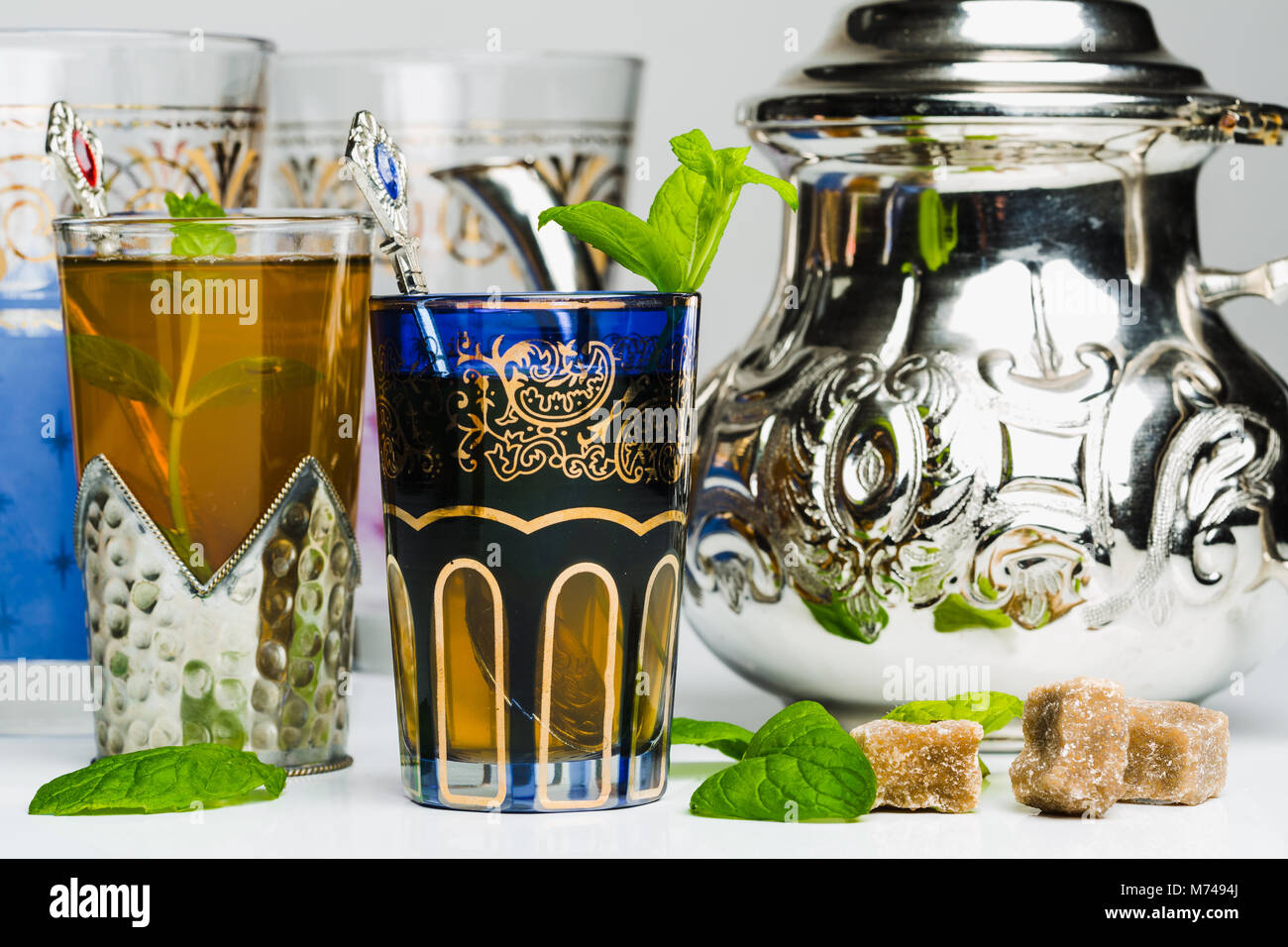 Arabic mint tea in a traditional decorated cup Stock Photo - Alamy