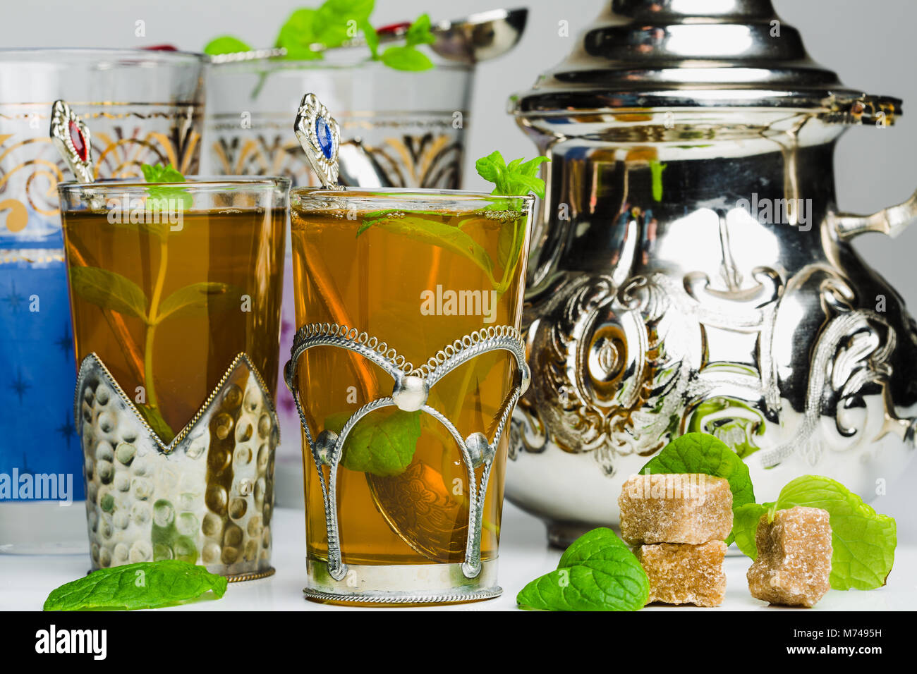 Arabic mint tea in a traditional decorated cup Stock Photo - Alamy