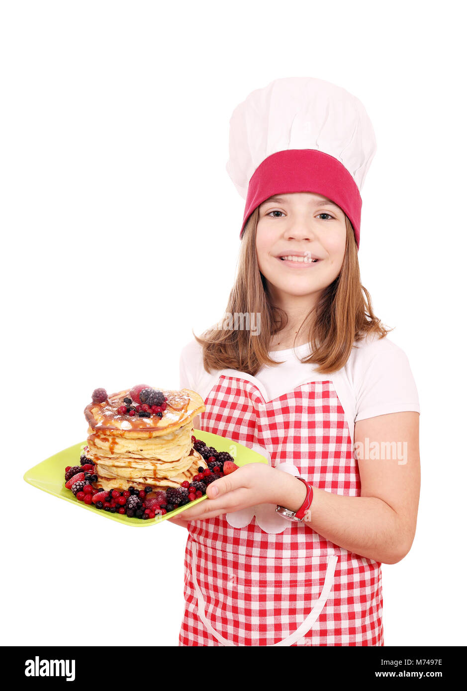 Happy little girl cook with sweet pancakes on plate Stock Photo - Alamy